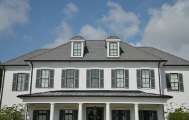 hecker ridge tiles white house with grey roof tiles and brown lap ridge ...